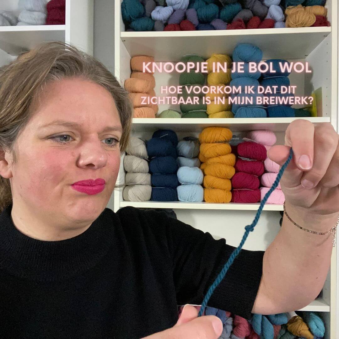 Knoopje in een bol wol